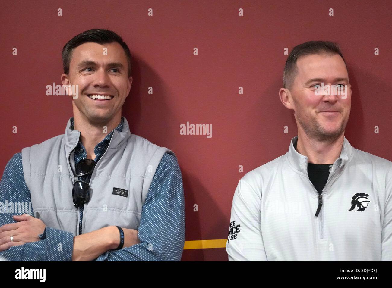 Southern California Trojans general manager Chad Bowden (left) and ...