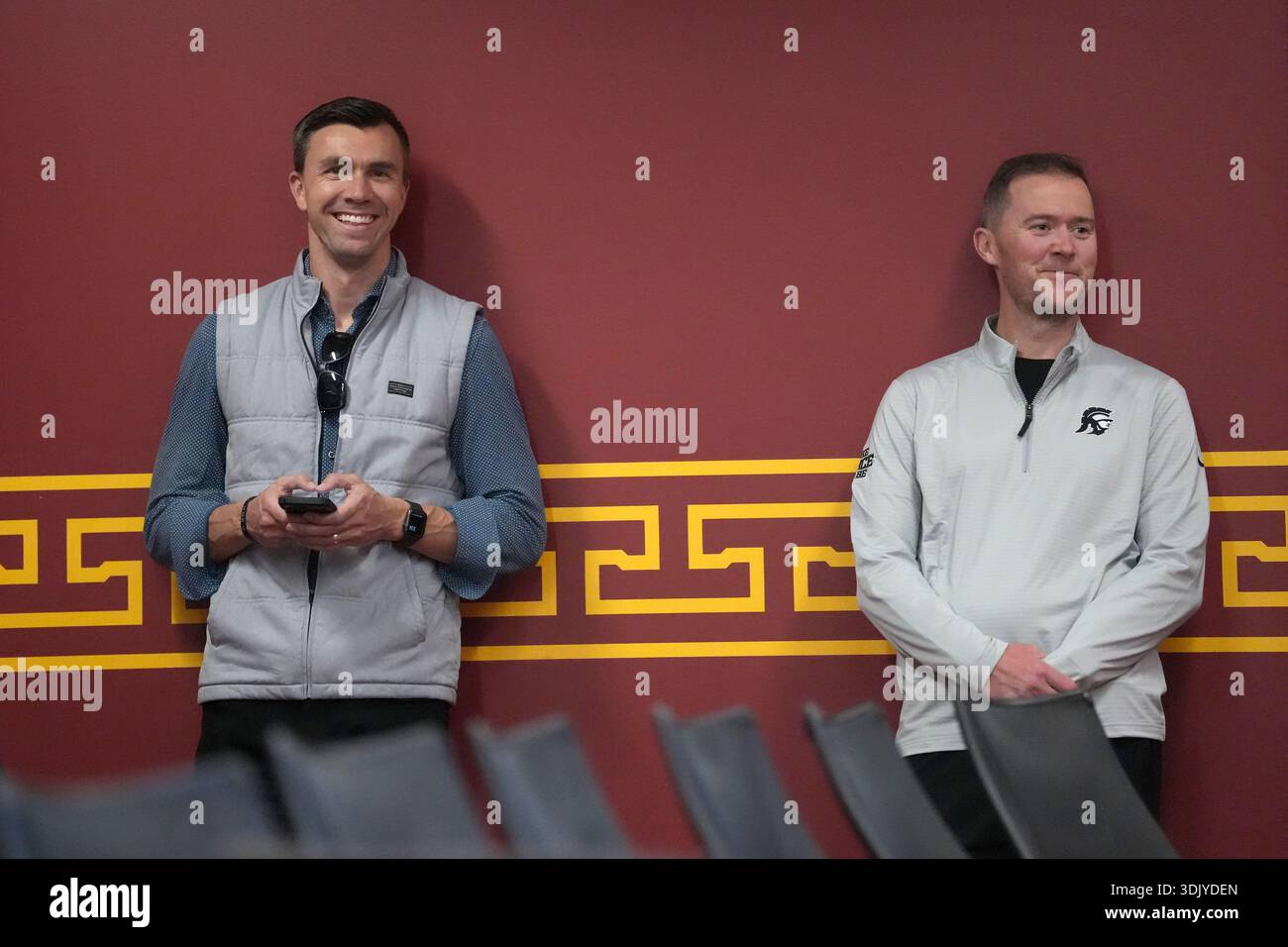 Southern California Trojans general manager Chad Bowden (left) and ...
