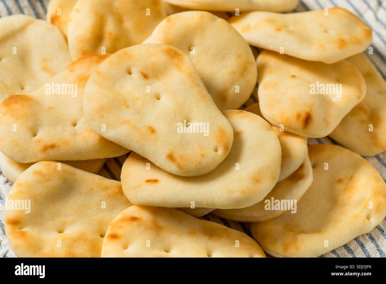 Healthy Mini Indian Naan Bread in a PIle to Eat Stock Photo - Alamy