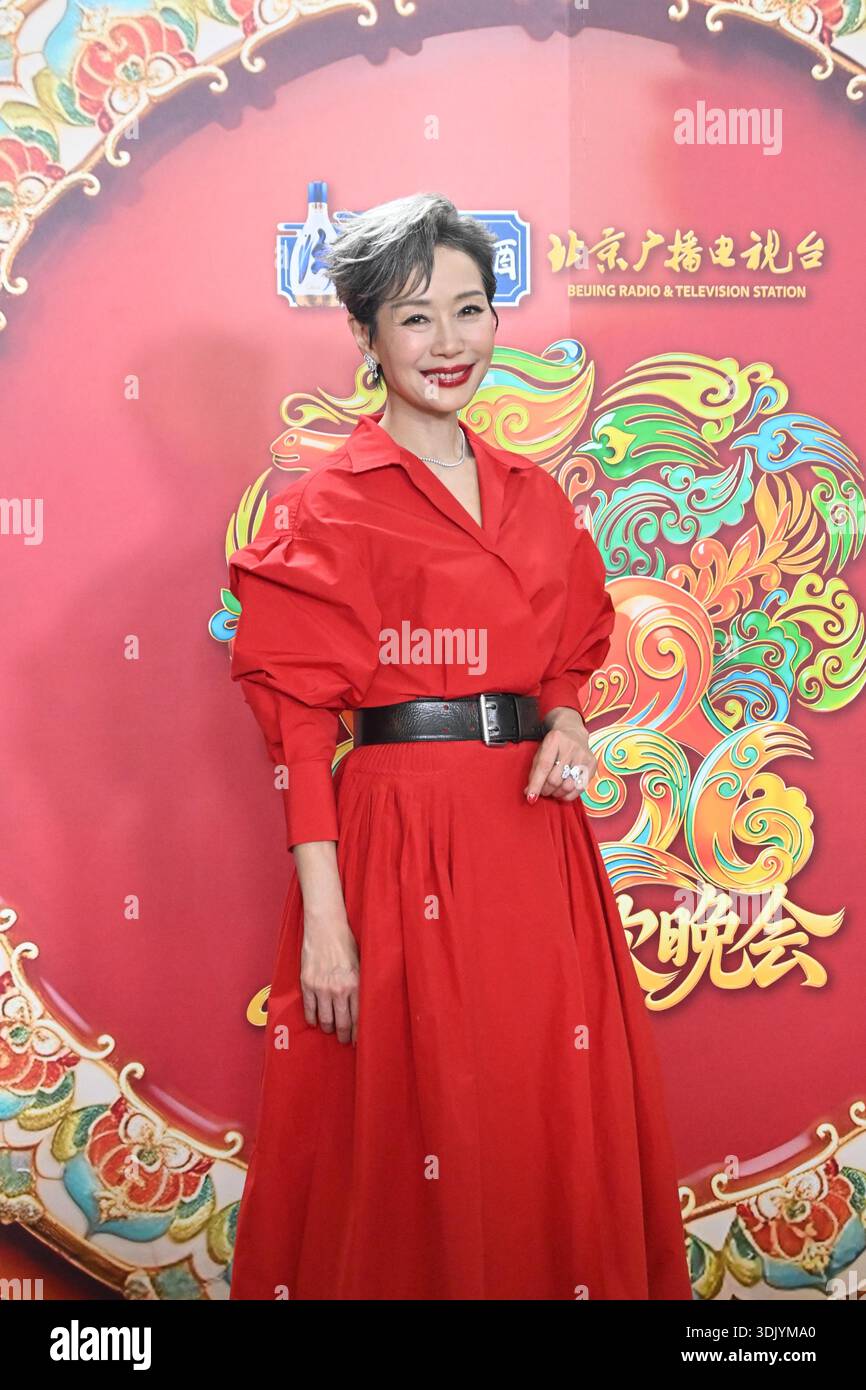 Hong Kong actress Cecilia Yip appears in red dress during an interview ...