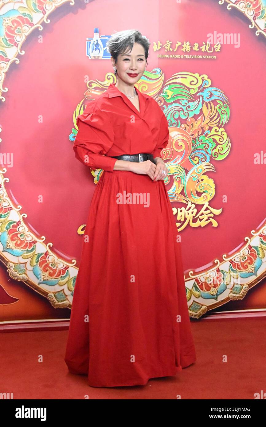 Hong Kong actress Cecilia Yip appears in red dress during an interview ...