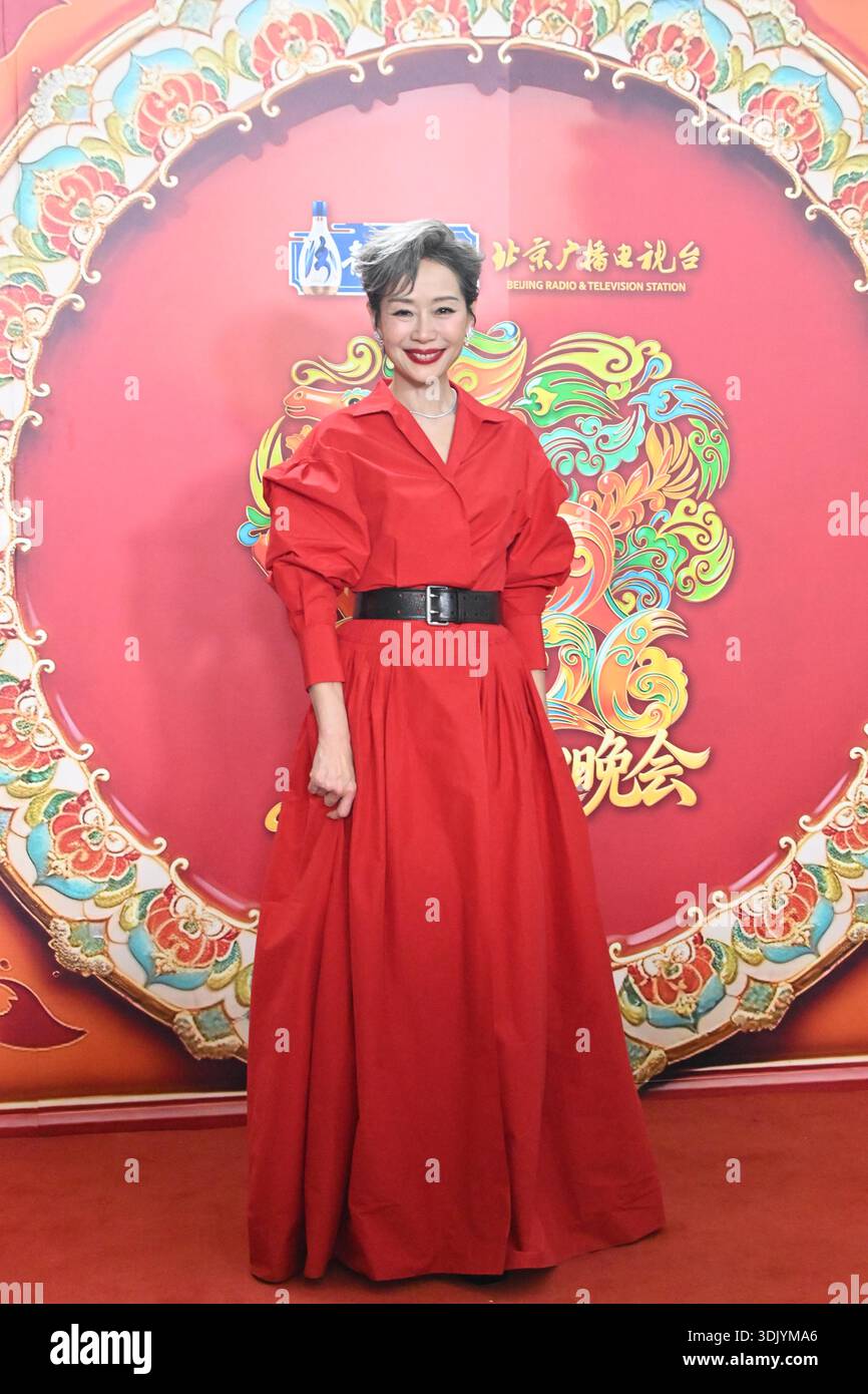 Hong Kong actress Cecilia Yip appears in red dress during an interview ...