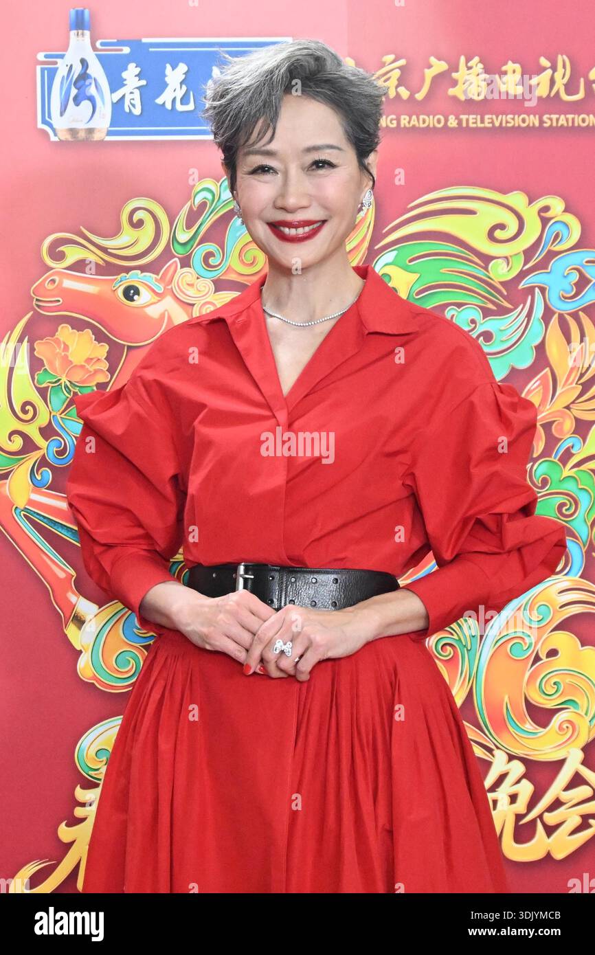 Hong Kong actress Cecilia Yip appears in red dress during an interview ...