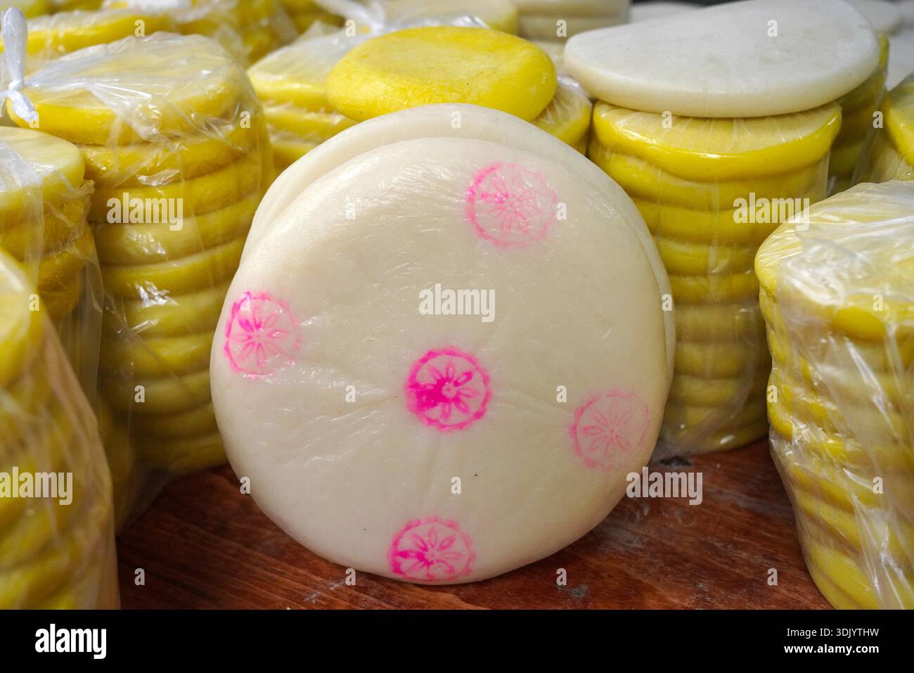 Workers make and sell glutinous rice cakes known as ciba in Quanzhou ...