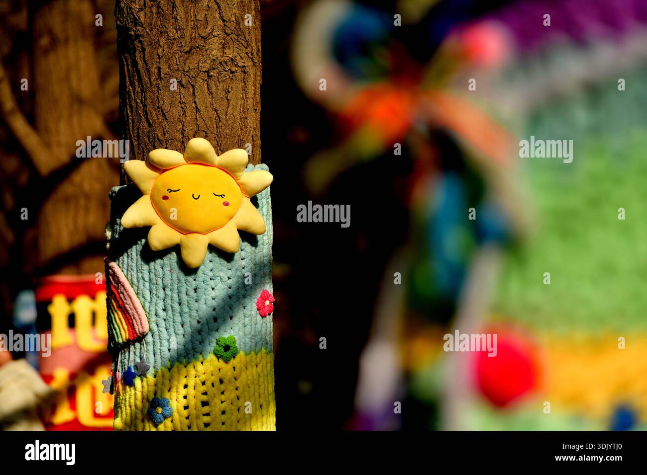 Trees are covered with sweaters to protect them from the cold at Ditan ...