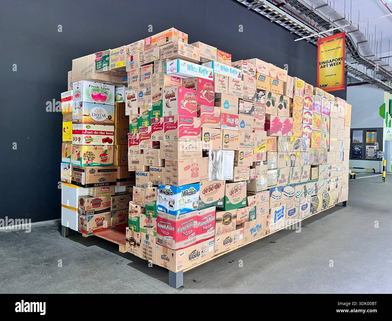 Display of artwork of carton boxes forming standard 20 foot shipping ...