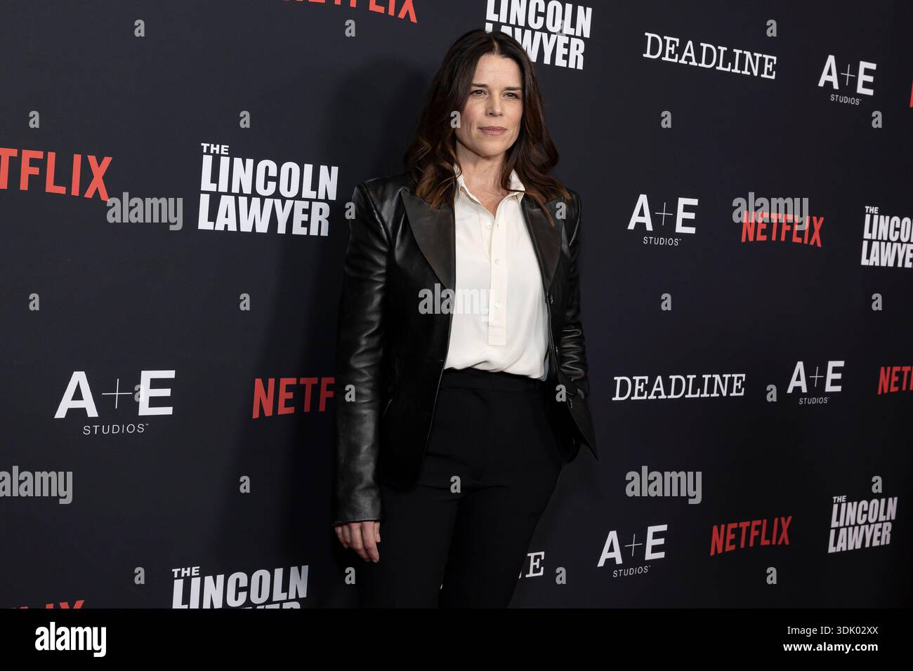 Neve Campbell attends the arrivals of Netflix’s “THE LINCOLN LAWYER ...