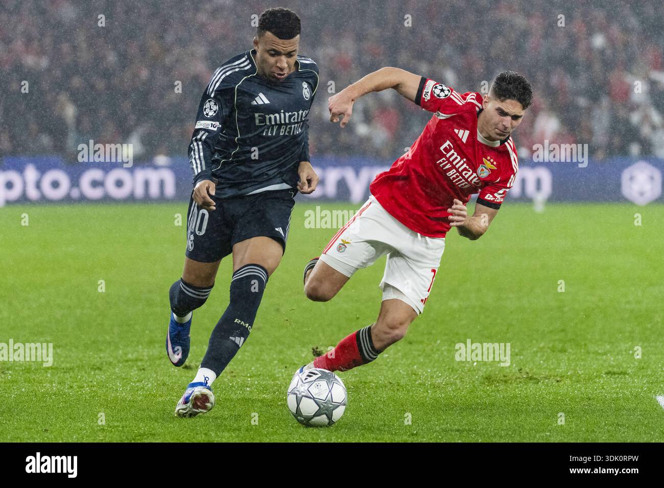 Kylian Mbappe of Real Madrid and Georgiy Sudakov of SL Benfica during ...