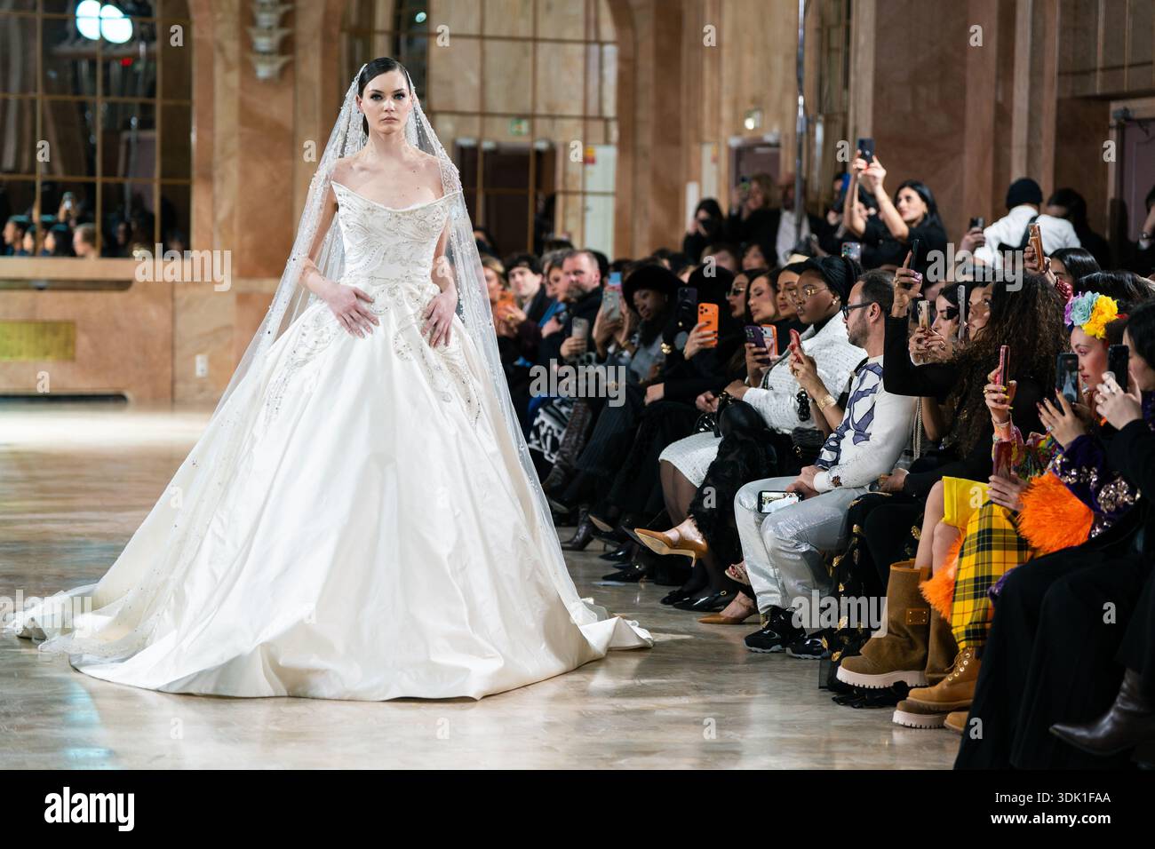 A model walks the runway during the Robert Abi Nader Haute Couture Week ...