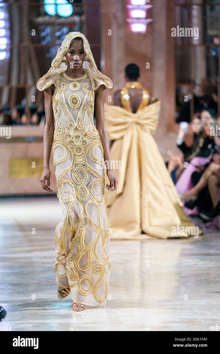 A model walks the runway during the Robert Abi Nader Haute Couture Week ...