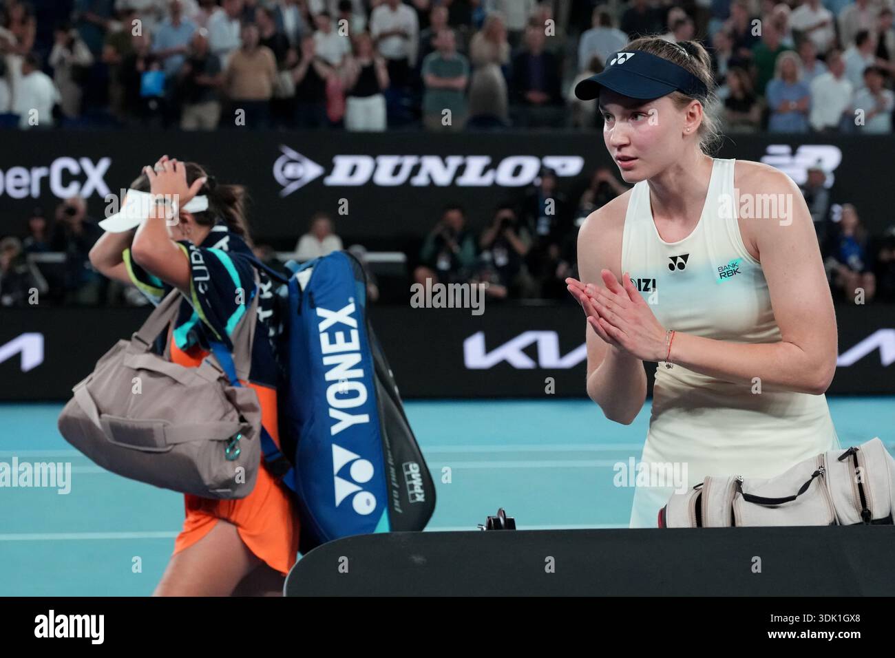 Elena Rybakina, right, of Kazakhstan reacts after winning her semifinal ...