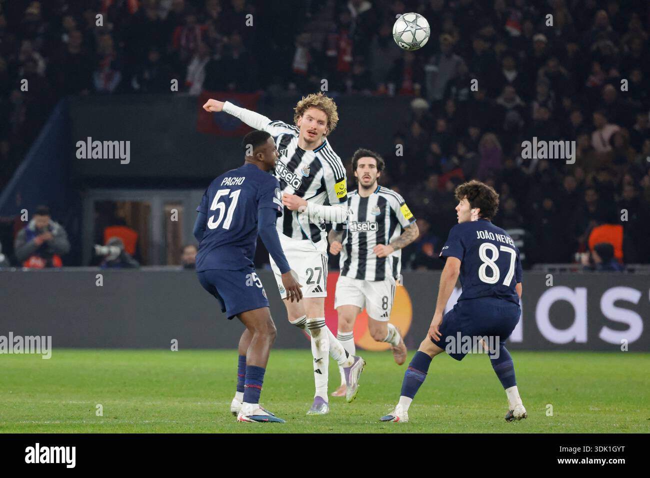 PSG’s Willian Pacho battles Newcastle’s Nick Woltemade during the 2025 ...