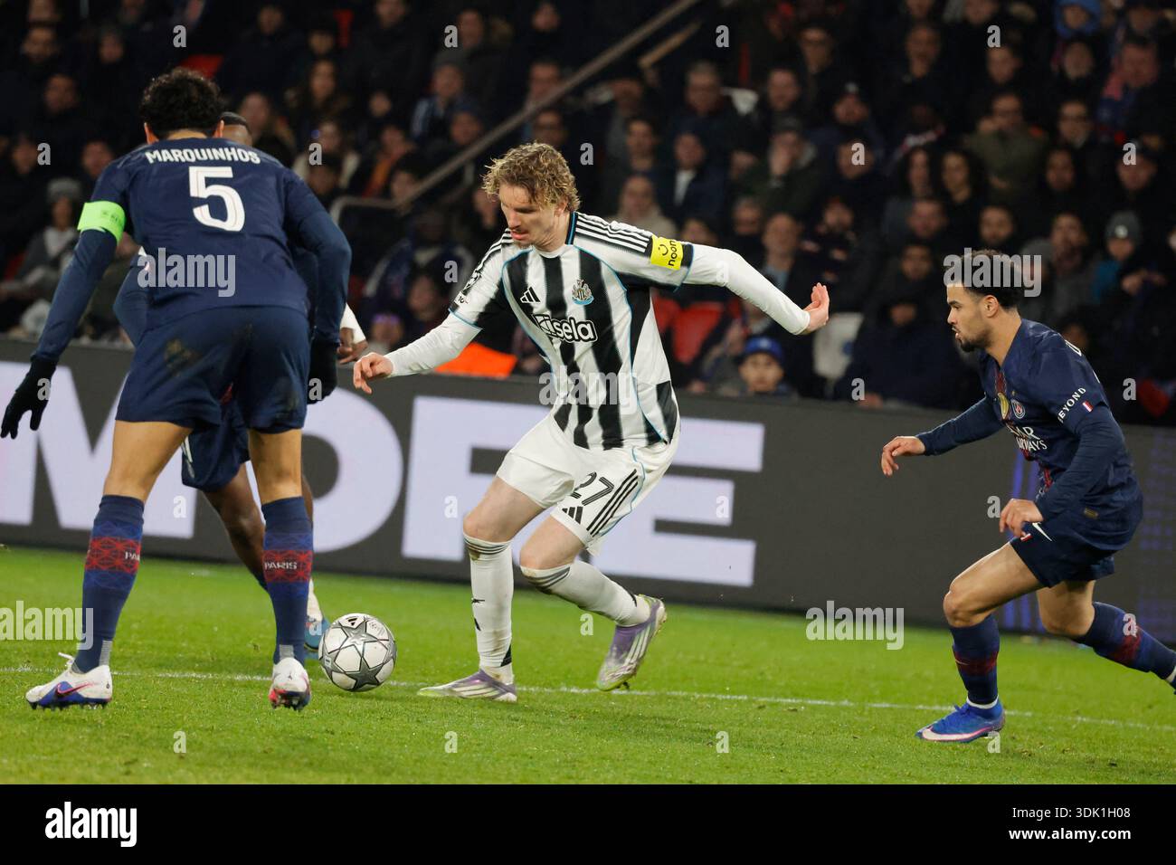 PSG’s Warren Zaire-Emery battles Newcastle’s Nick Woltemade during the ...