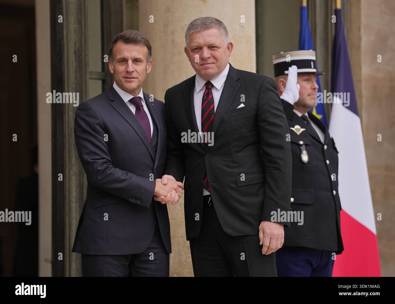 France's President Emmanuel Macron, left, welcomes Slovakia's Prime ...