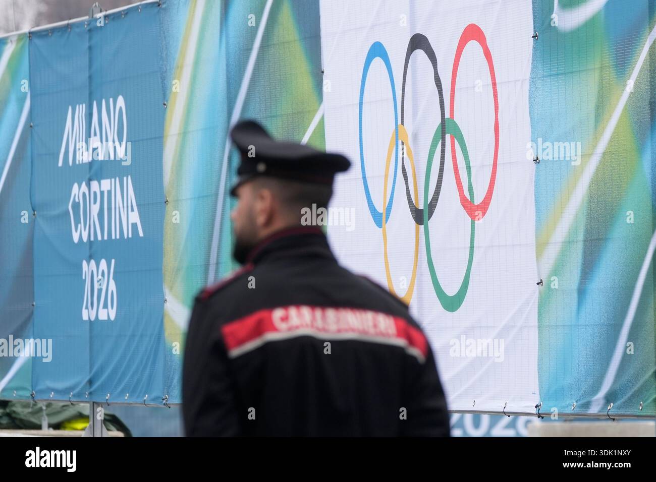 A Carabiniere paramilitary police officer patrols, the entrance of the ...
