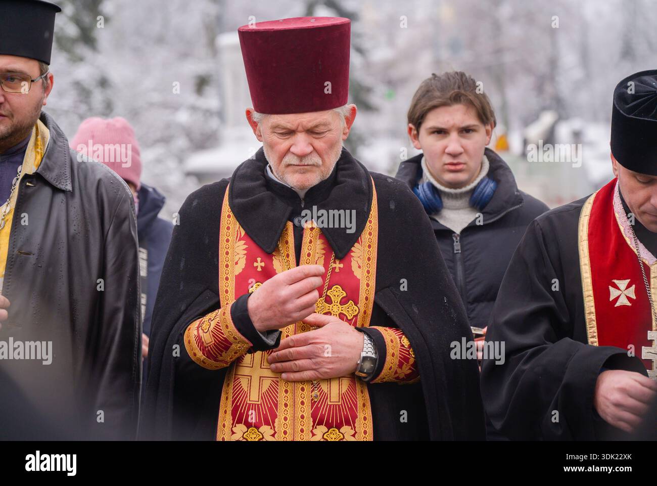 Kyiv, Ukraine - 29th January,2026: Orthodox priest in red headpiece and ...