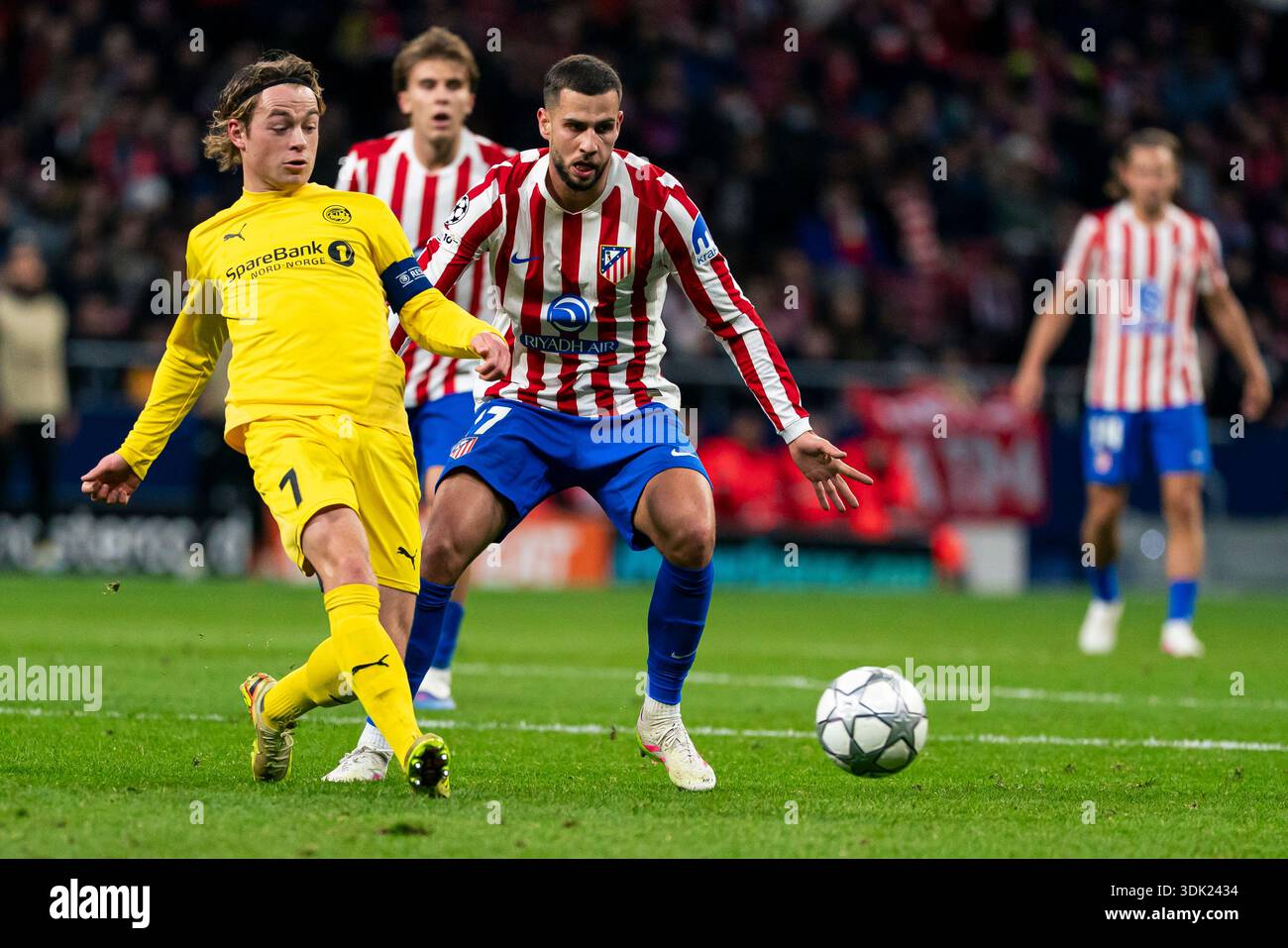 Atletico de Madrid's David Hancko (r) and FK Bodo/Glimt's Patrick Berg ...
