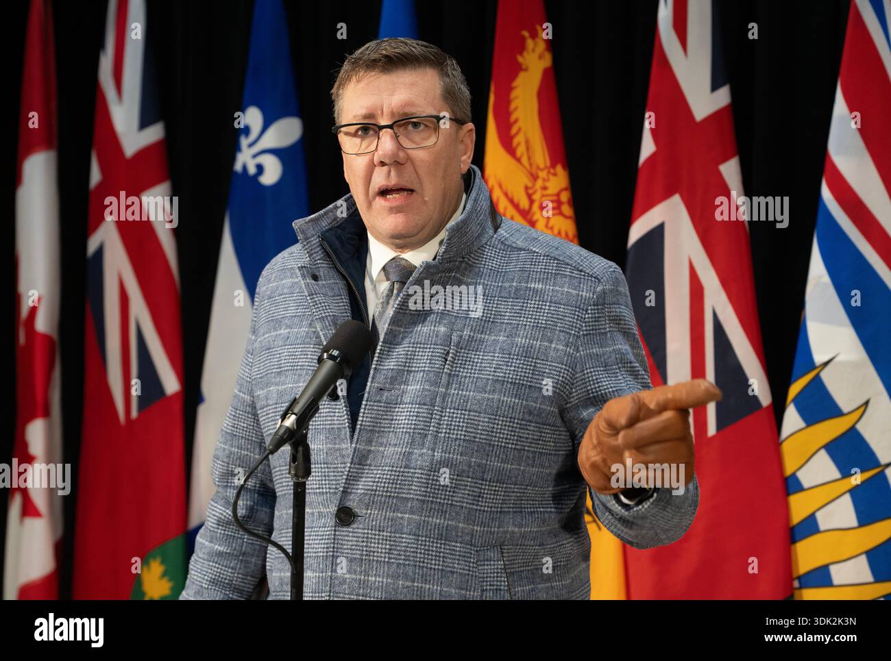 Saskatchewan Premier Scott Moe speaks with reporters before the First ...