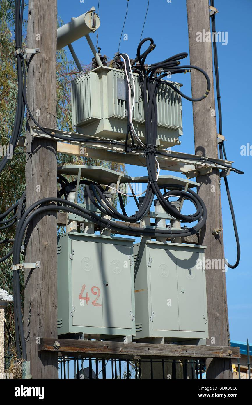 Electric power transformer on utility pole Stock Photo - Alamy