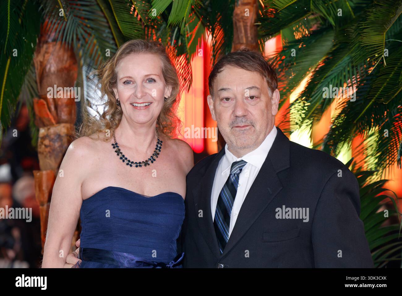 Yvonne Flores, left, and director Sam Raimi pose for photographers upon ...