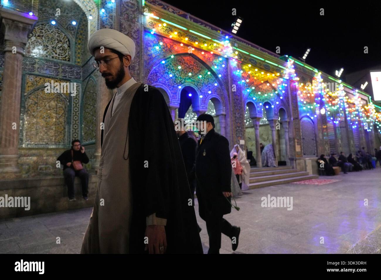 A cleric walks through the Shiite Saints Abdulazim and Taher shrine in ...