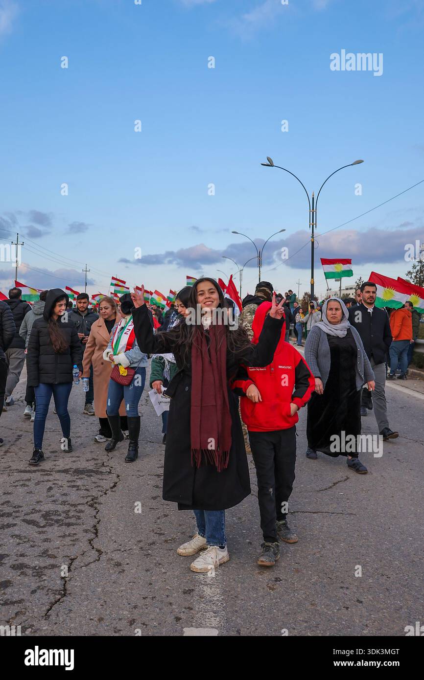 Kurdish protesters wave national flags as they demonstrate in support ...