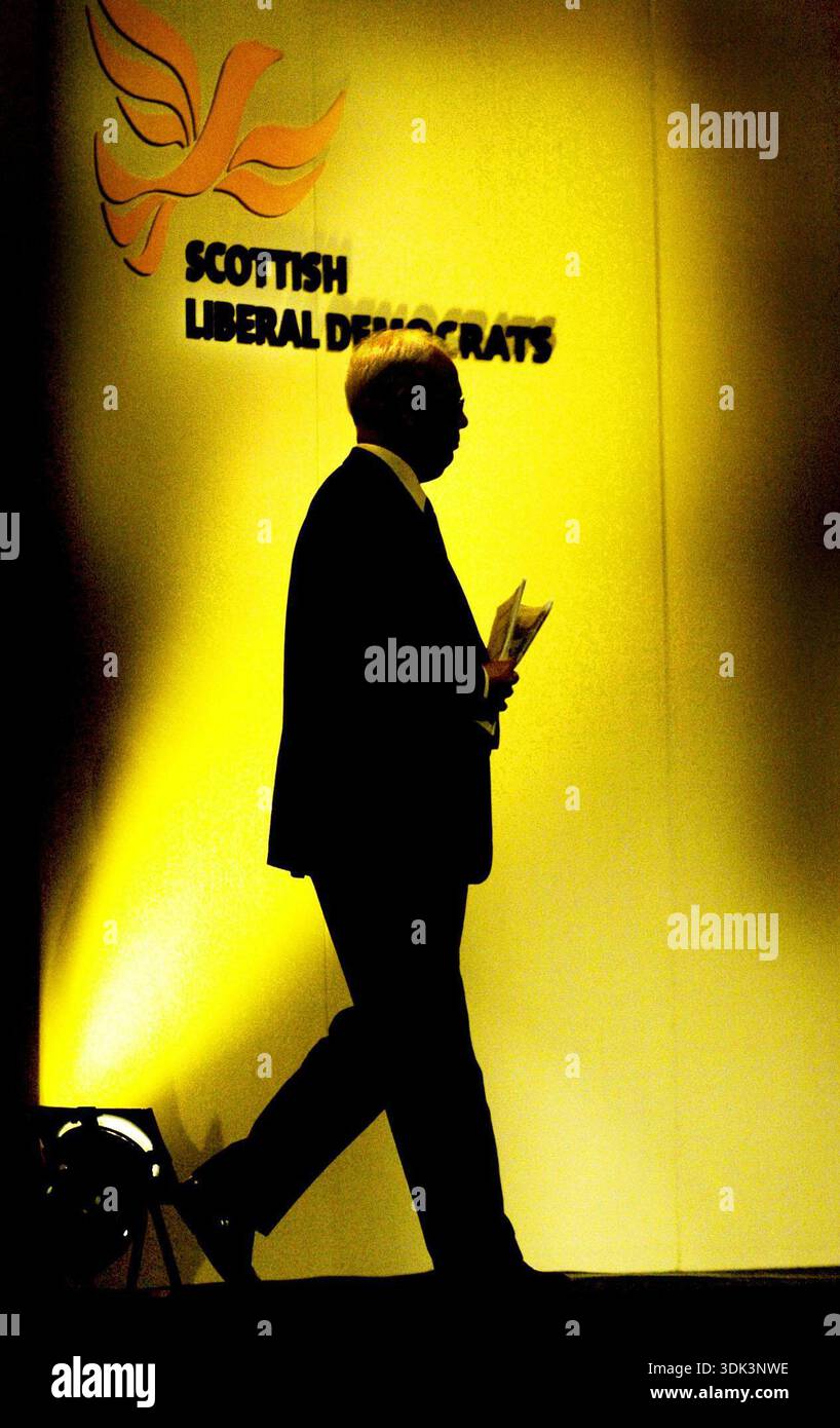 File photo originally used 27/03/04 of Jim Wallace heading on stage in ...
