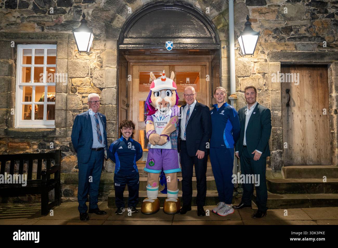 (left to right) Chair George Black CBE, athlete Finlay Davidson, mascot ...