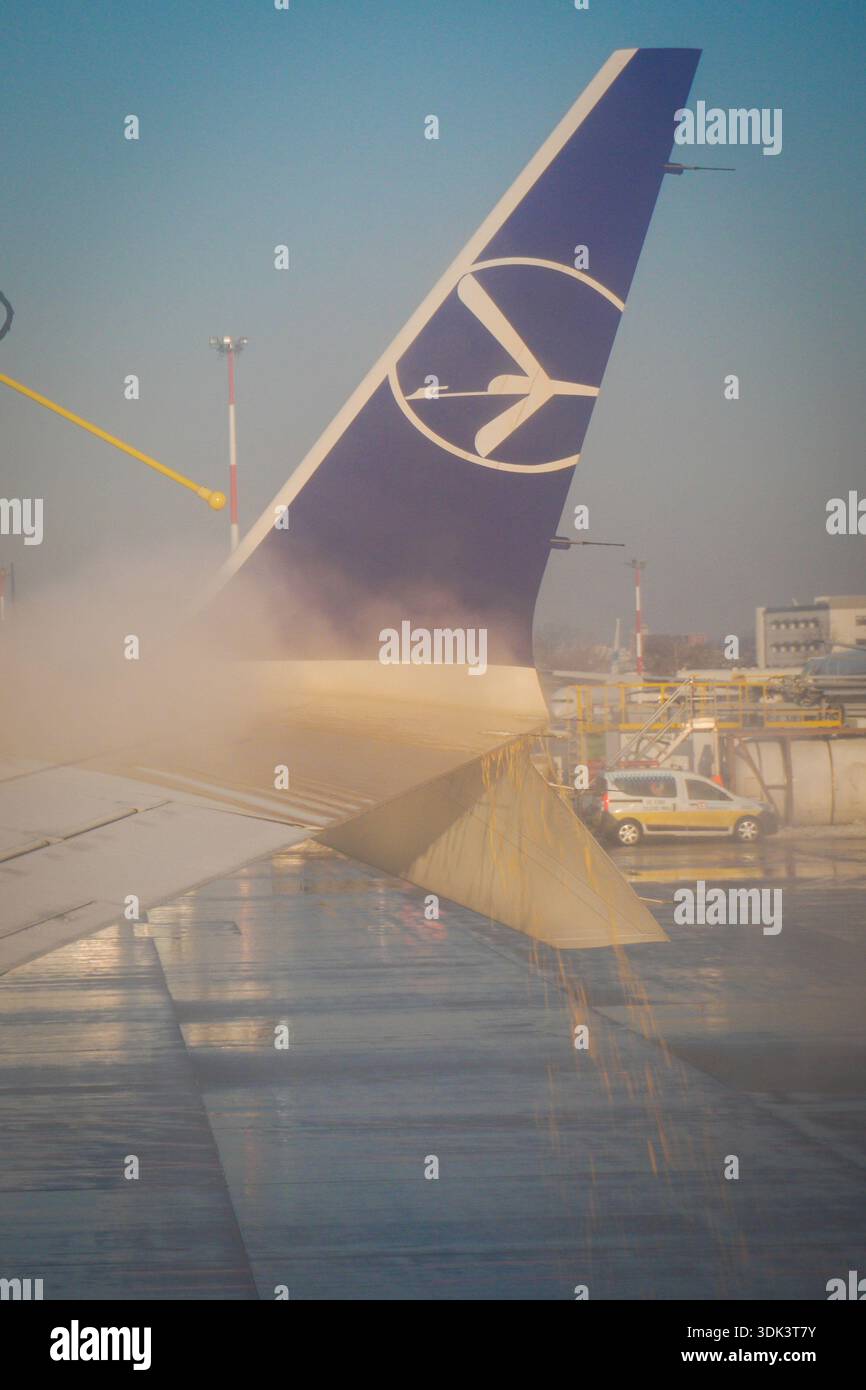 A LOT Polish Airlines Boeing 737 is seen being deiced in Warsaw, Poland ...