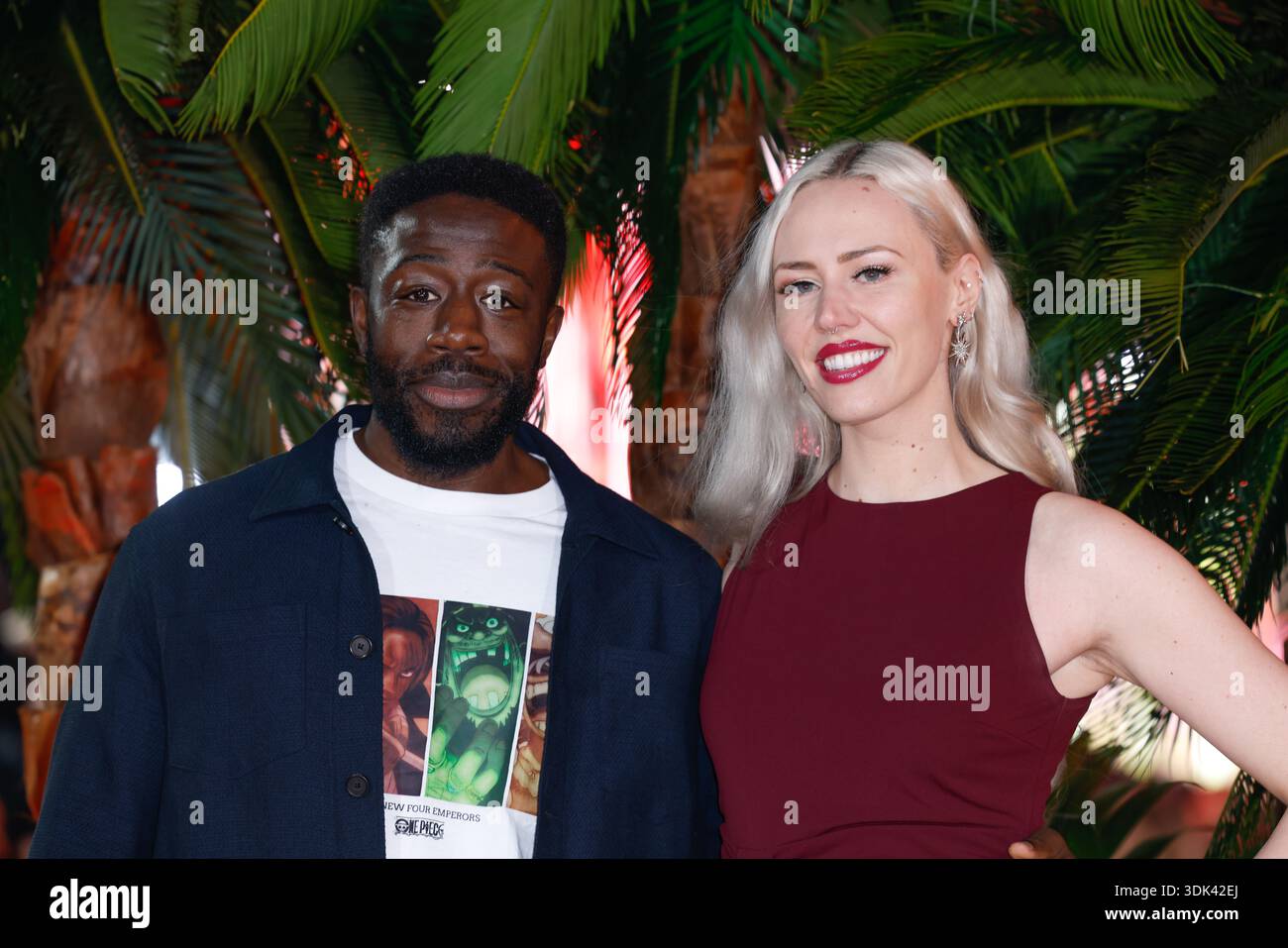 Ross Garshong, left, and Ellie Buckley pose for photographers upon ...