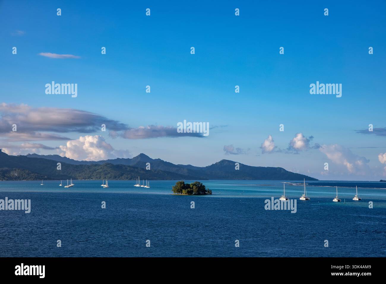 Sailboats in the lagoon, Raiatea, Leeward Islands, French Polynesia ...