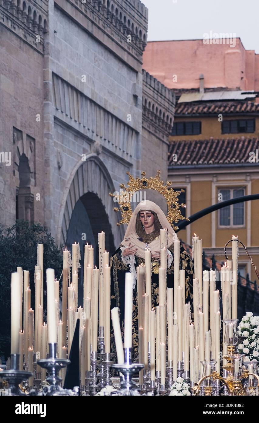 Virgin of Vineros in front of the historic Nasrid gate of Atarazanas ...