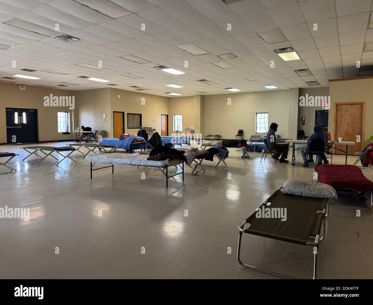 A smattering of people sit around the Humphreys County warming center ...