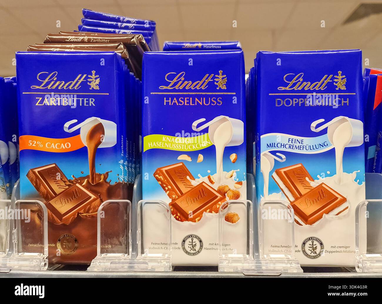 Kiel, Germany - 28. January 2026: Lindt chocolate bars line shelves ...