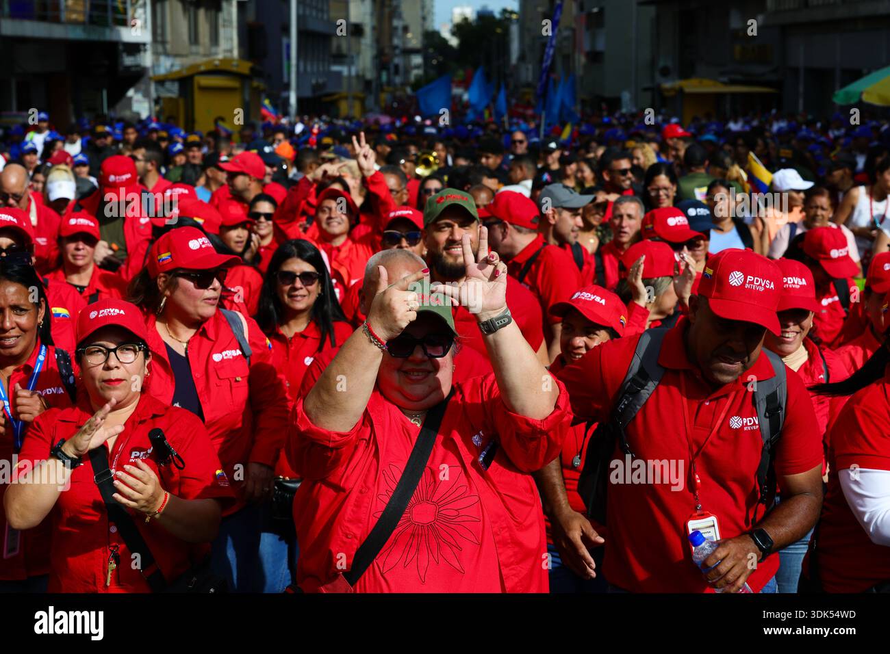 29 January 2026, Venezuela, Caracas: Workers from the oil sector take ...