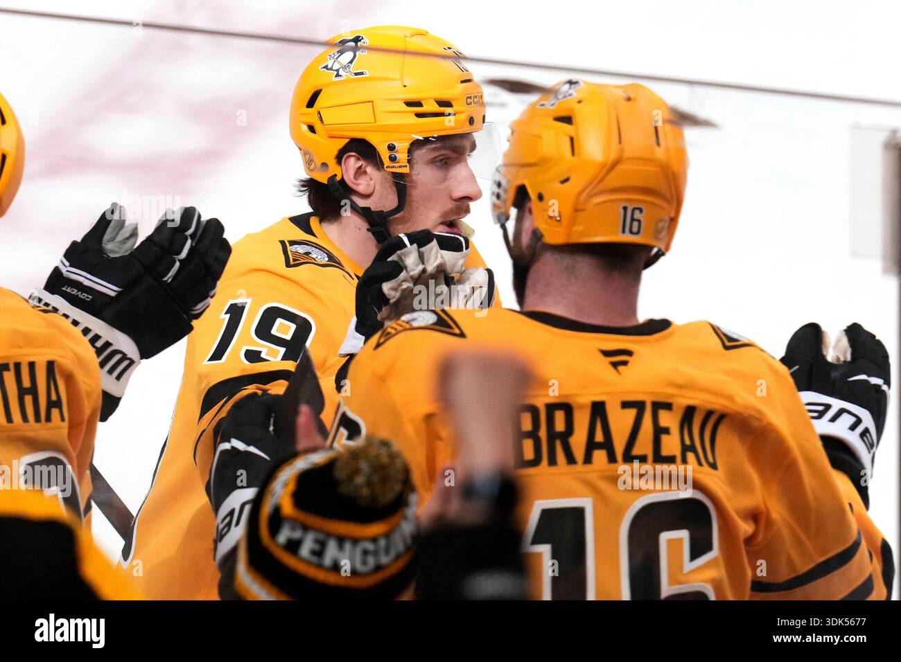 Pittsburgh Penguins' Connor Dewar (19) returns to the bench after ...
