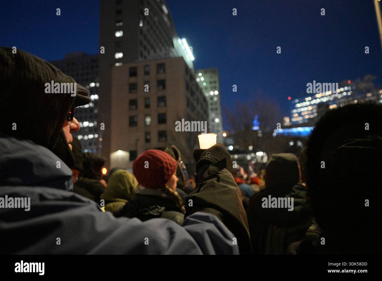 New York, New York, USA 29th Jan., 2026 Man holds candle during vigil ...
