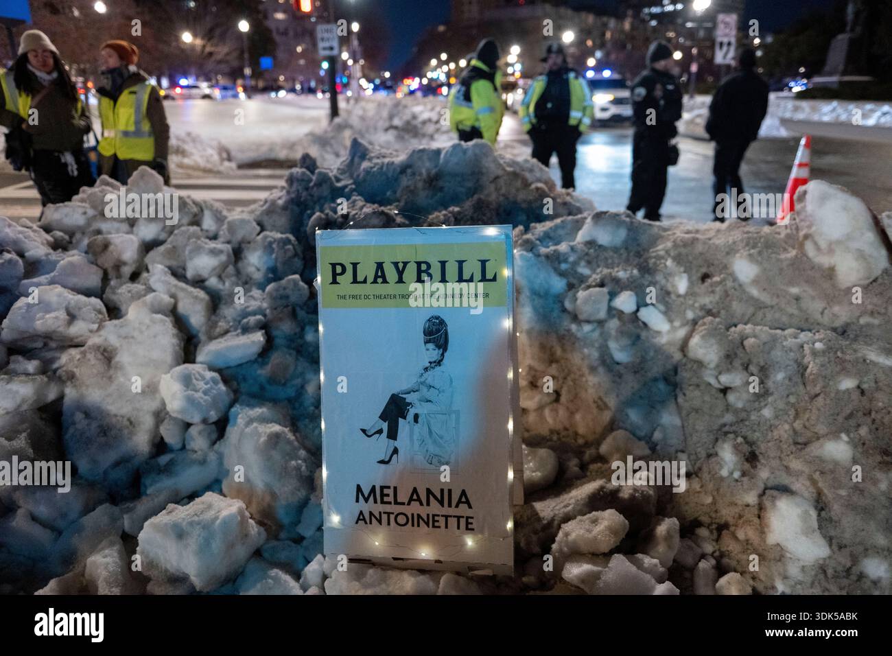 A fake playbill is placed in a pile of snow near The John F. Kennedy ...