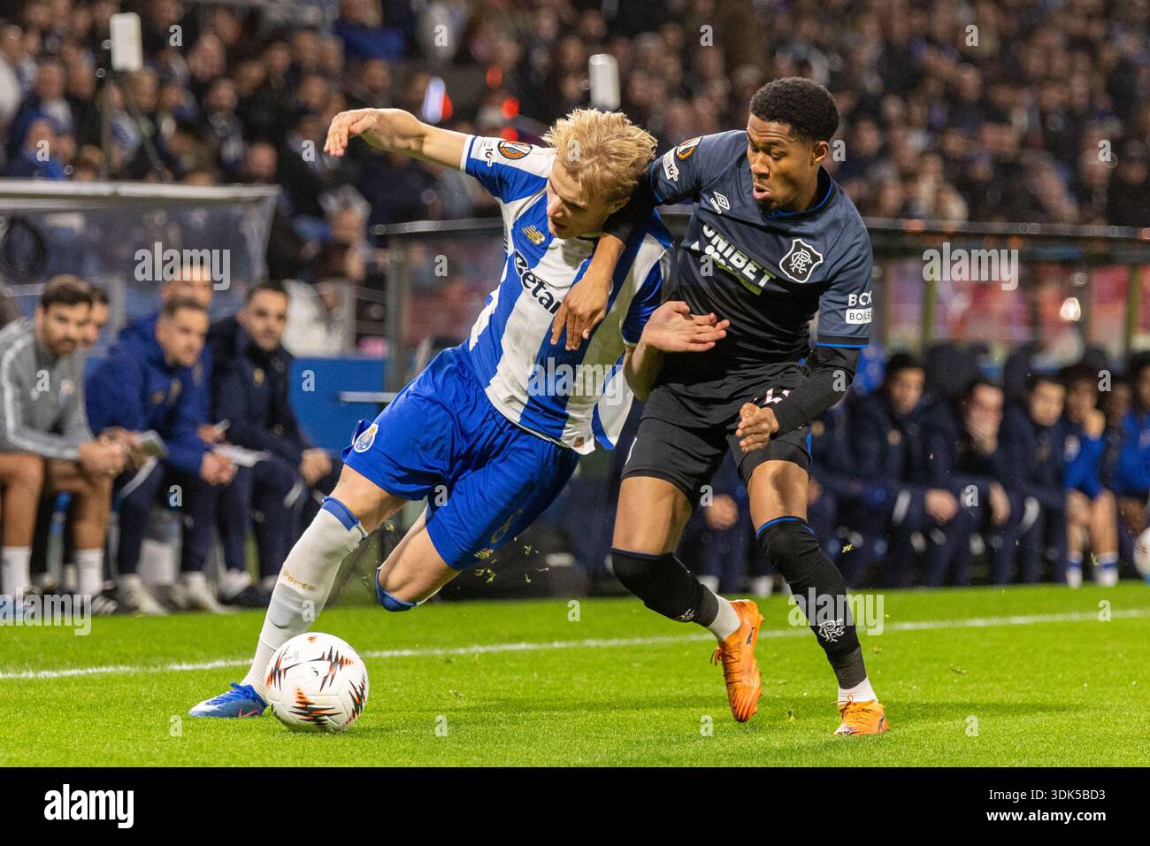 FC Porto's player Victor Frohold (L) and Rangers FC's Emmanuel ...