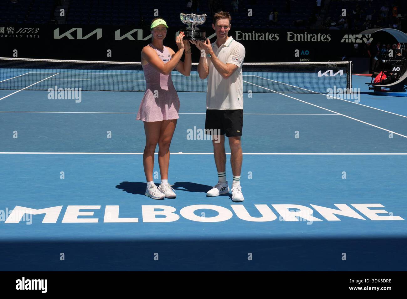 Australia's Olivia Gadecki and John Peers pose with their trophy after ...
