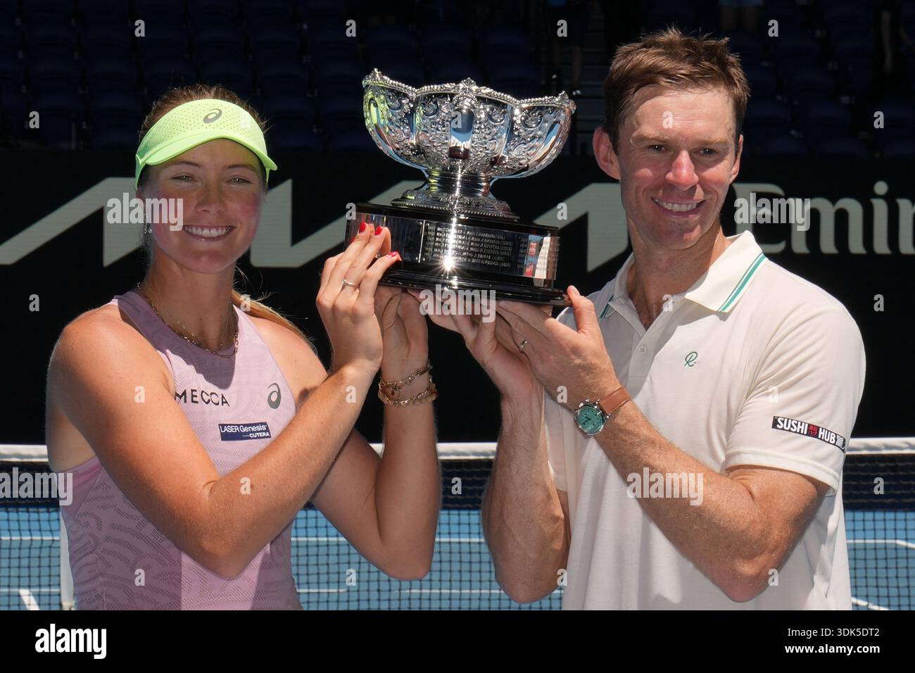 Australia's Olivia Gadecki, left, and John Peers pose with their trophy ...