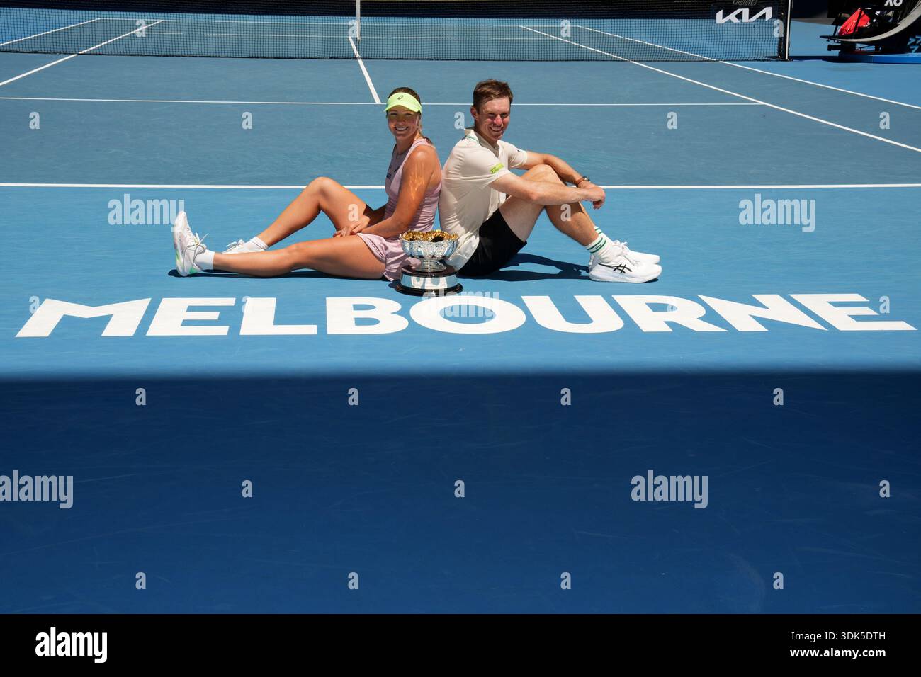 Australia's Olivia Gadecki and John Peers pose with their trophy after ...