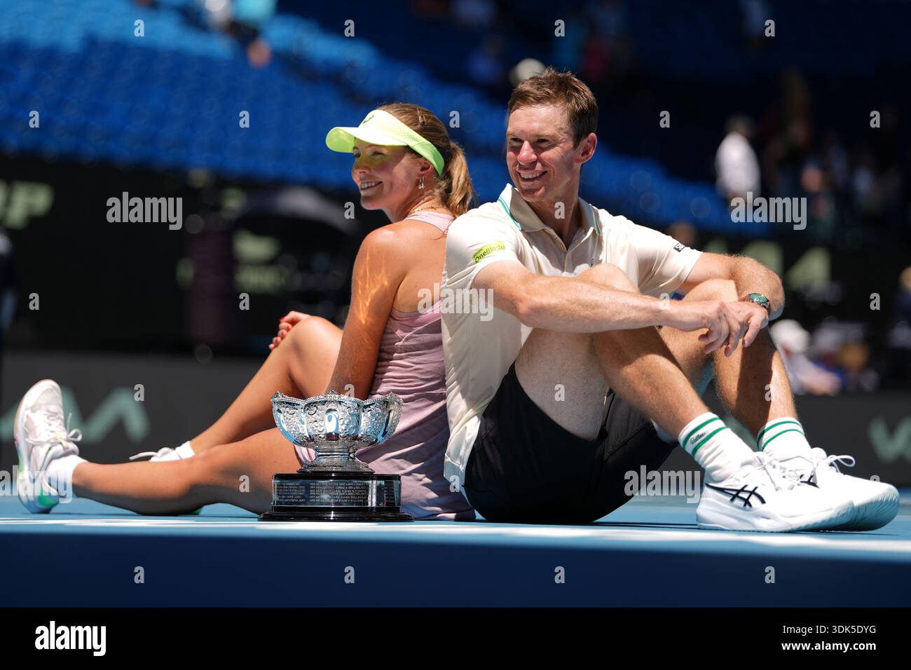 Australia's Olivia Gadecki and John Peers pose with their trophy after ...