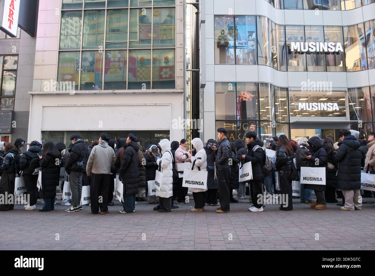 Seoul, South Korea - January 30, 2026: Crowd waiting in line outside ...