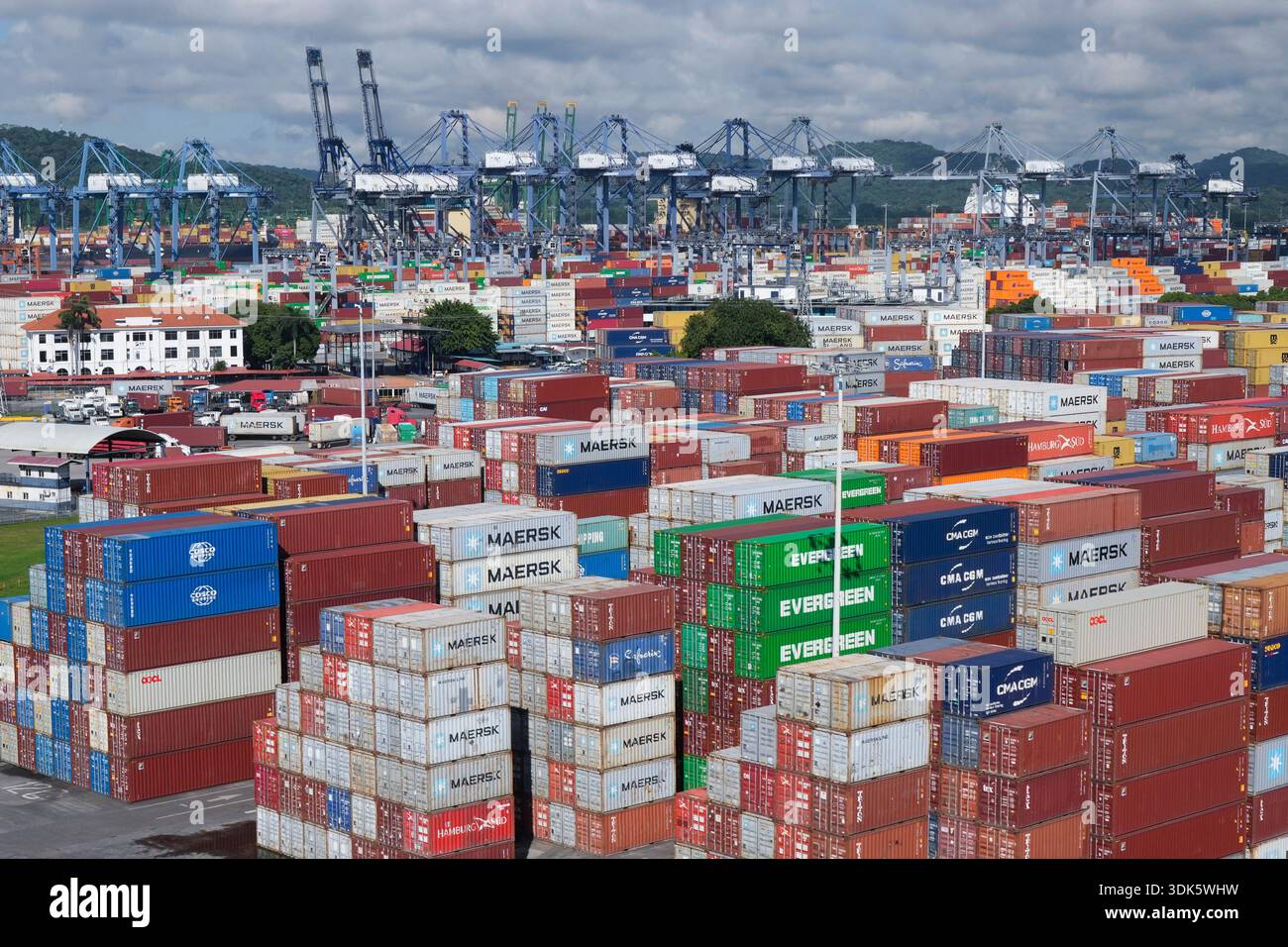 FILE - Ship containers are stacked at the Panama Canal Balboa port ...