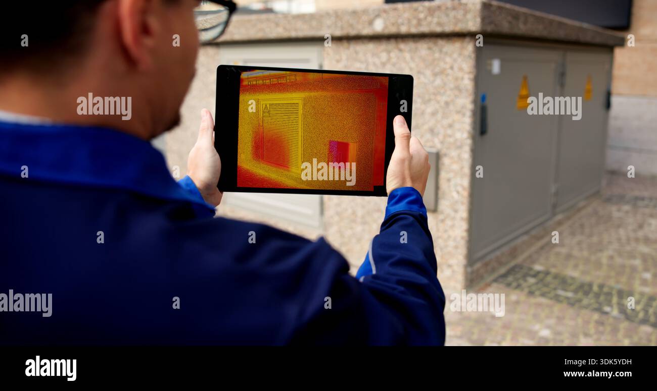 Electrical Engineer Performs Thermal Camera Safety Check On Fuse Box ...