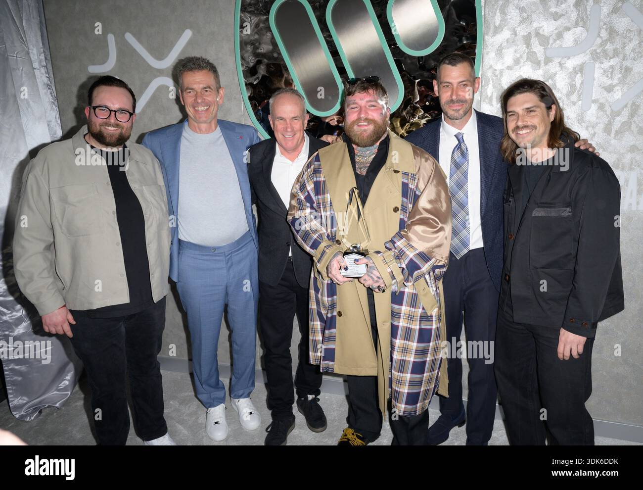 LOS ANGELES, USA. January 29, 2026: Robert Kyncl, Tom Corson, Teddy ...