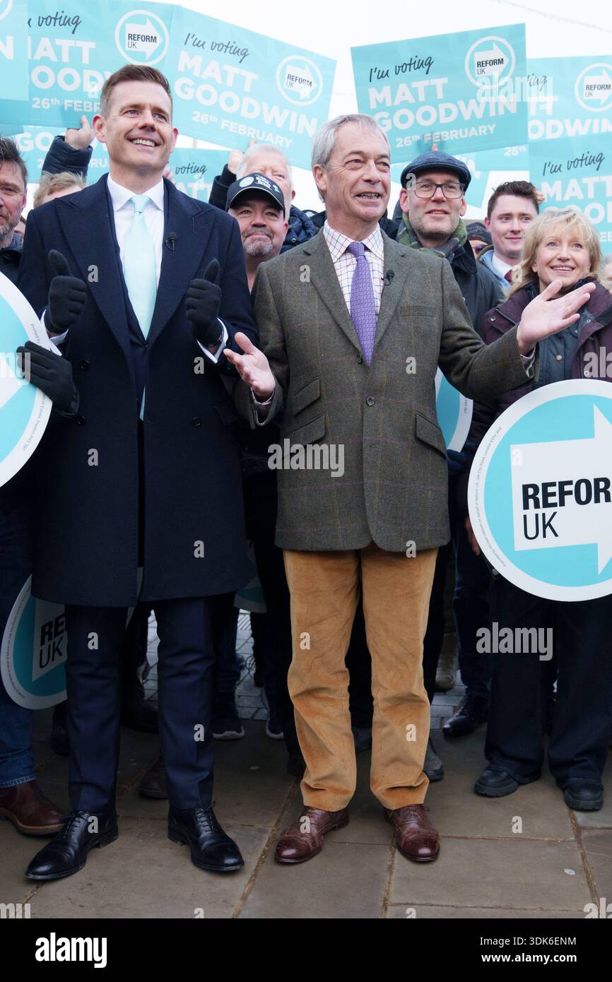 Reform leader Nigel Farage, centre right, stands with prospective ...
