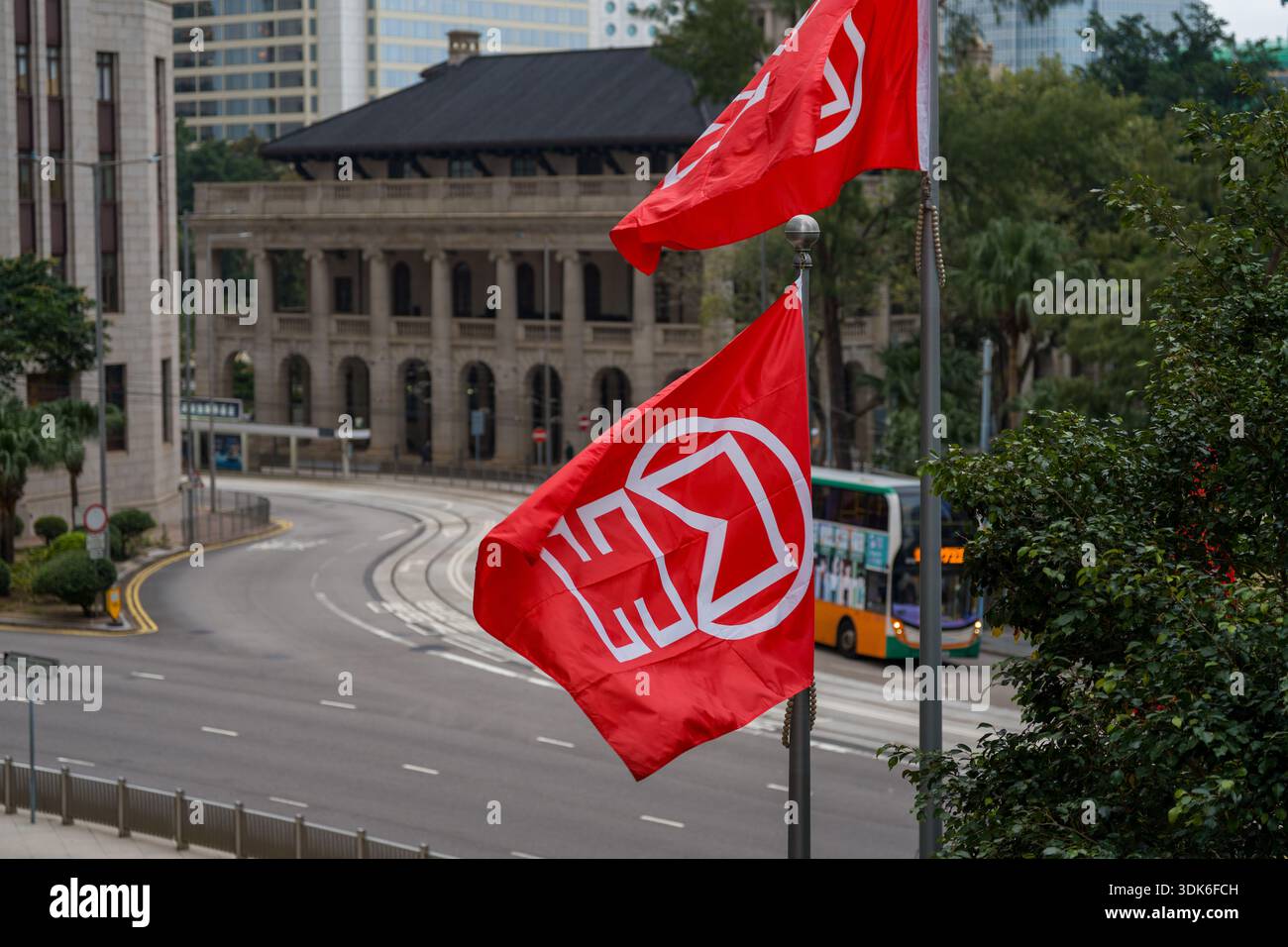 Flags waving outside Cheung Kong Center where the headquarters of CK ...