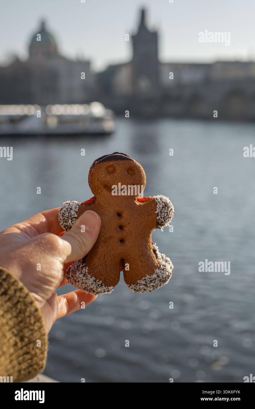 Hand holding gingerbread man hi-res stock photography and images - Alamy